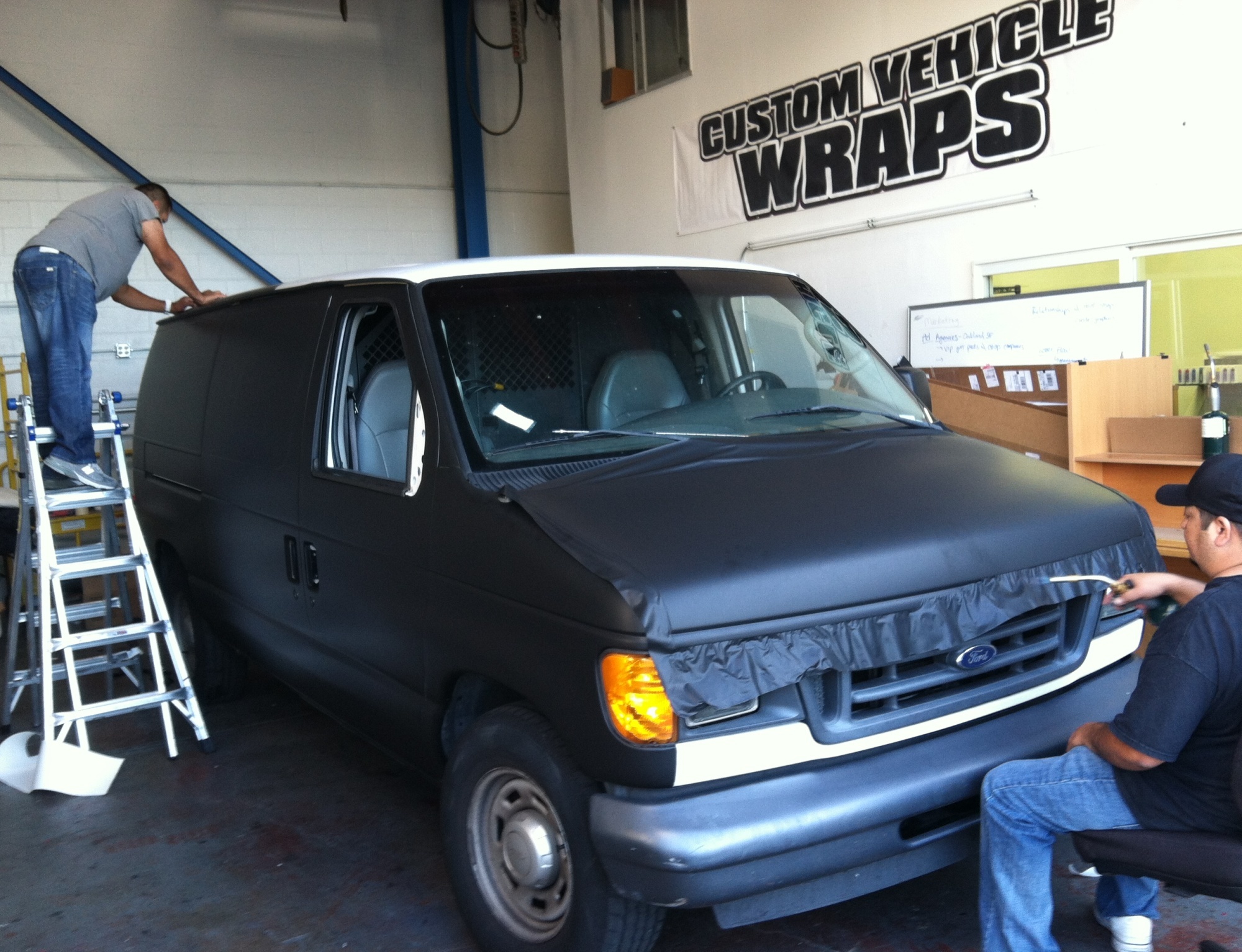 Matte Black Van Wrapping – Custom Vehicle Wraps