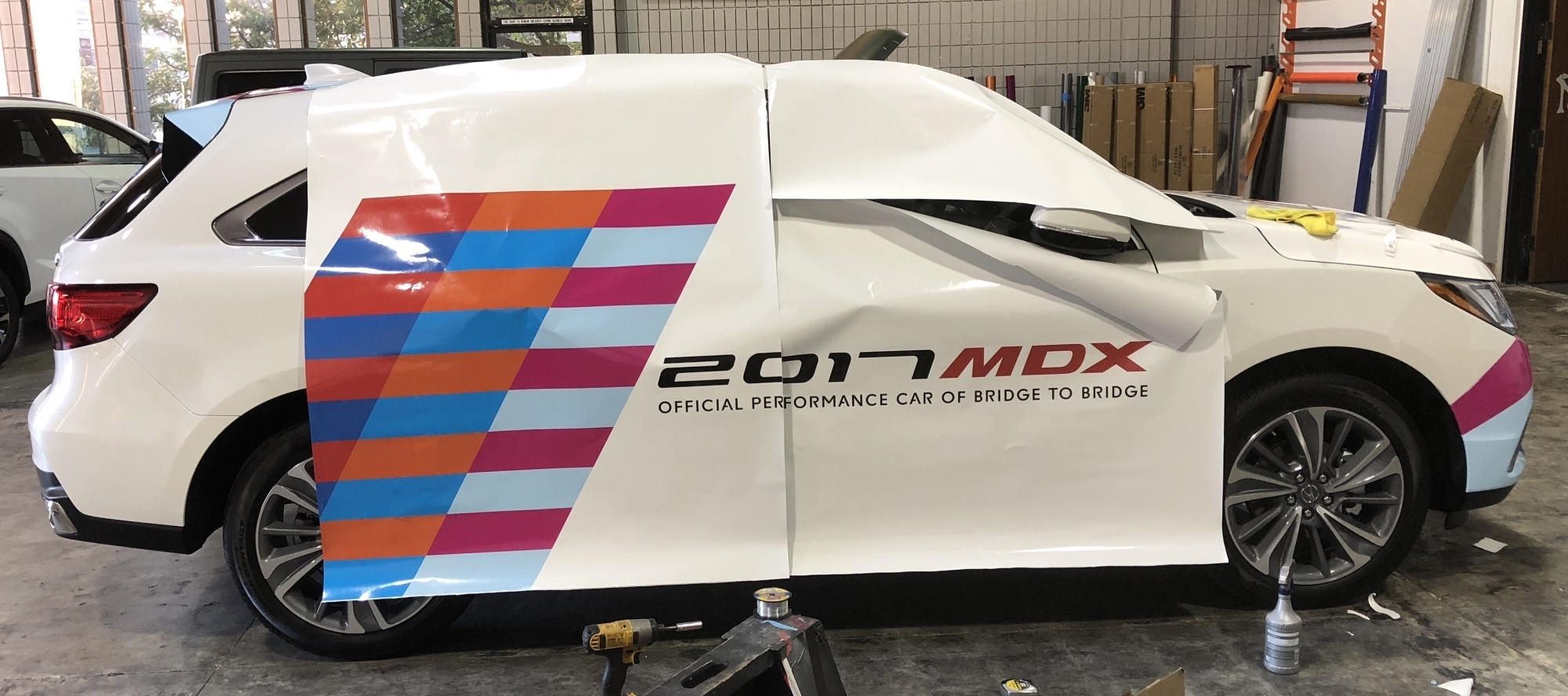Bridge To Bridge Promo Car Wrap for Acura MDX – Custom Vehicle Wraps