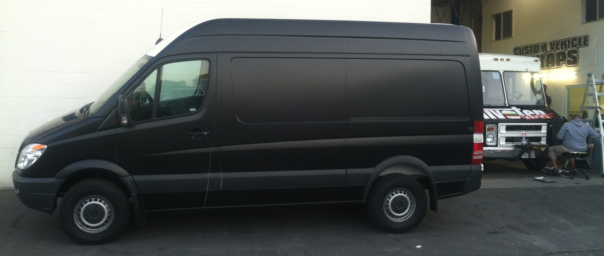 Van Color Change Wrap – White to Black – Custom Vehicle Wraps